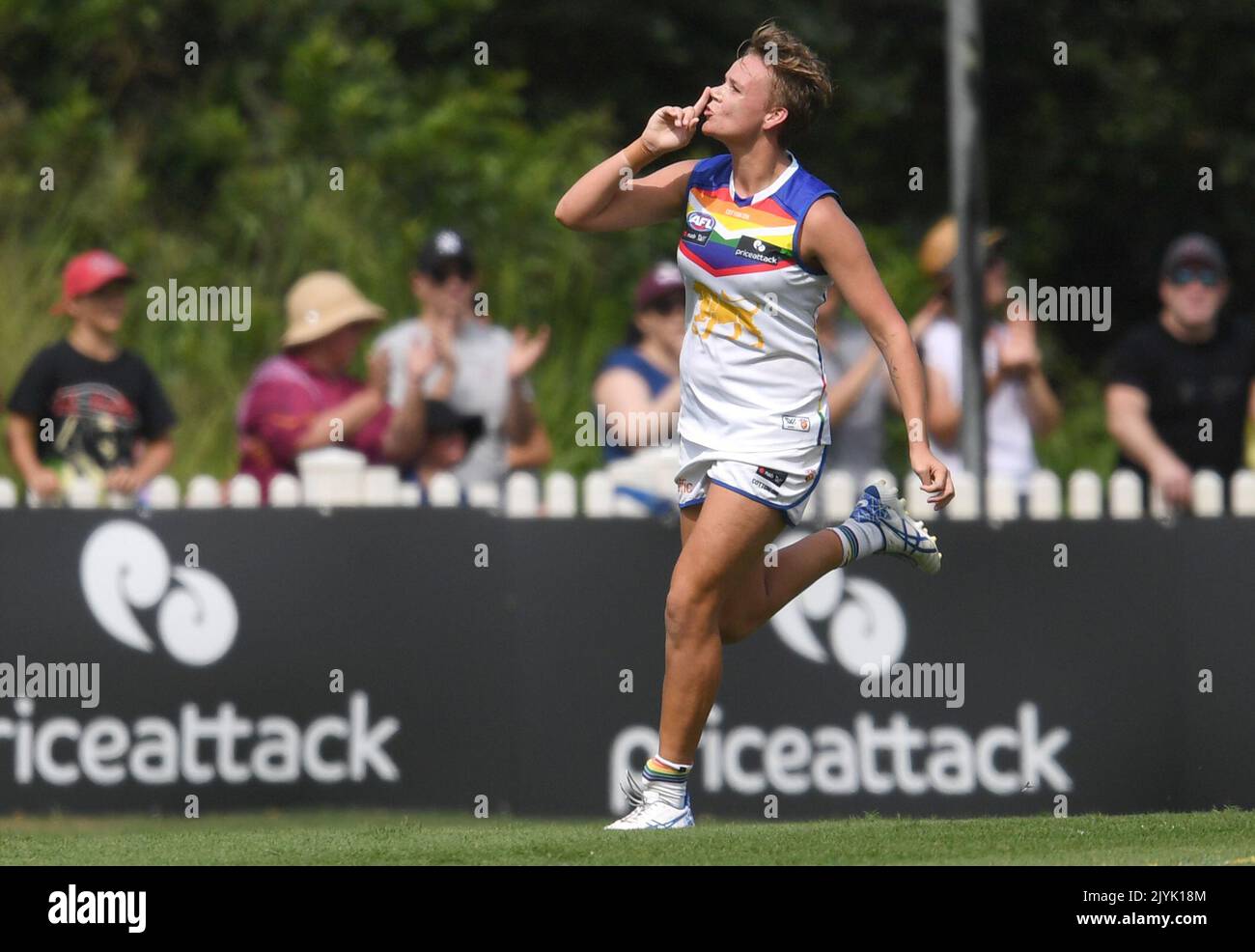 Dakota Davidson of the Lions celebrates kicking a goal during the Round ...