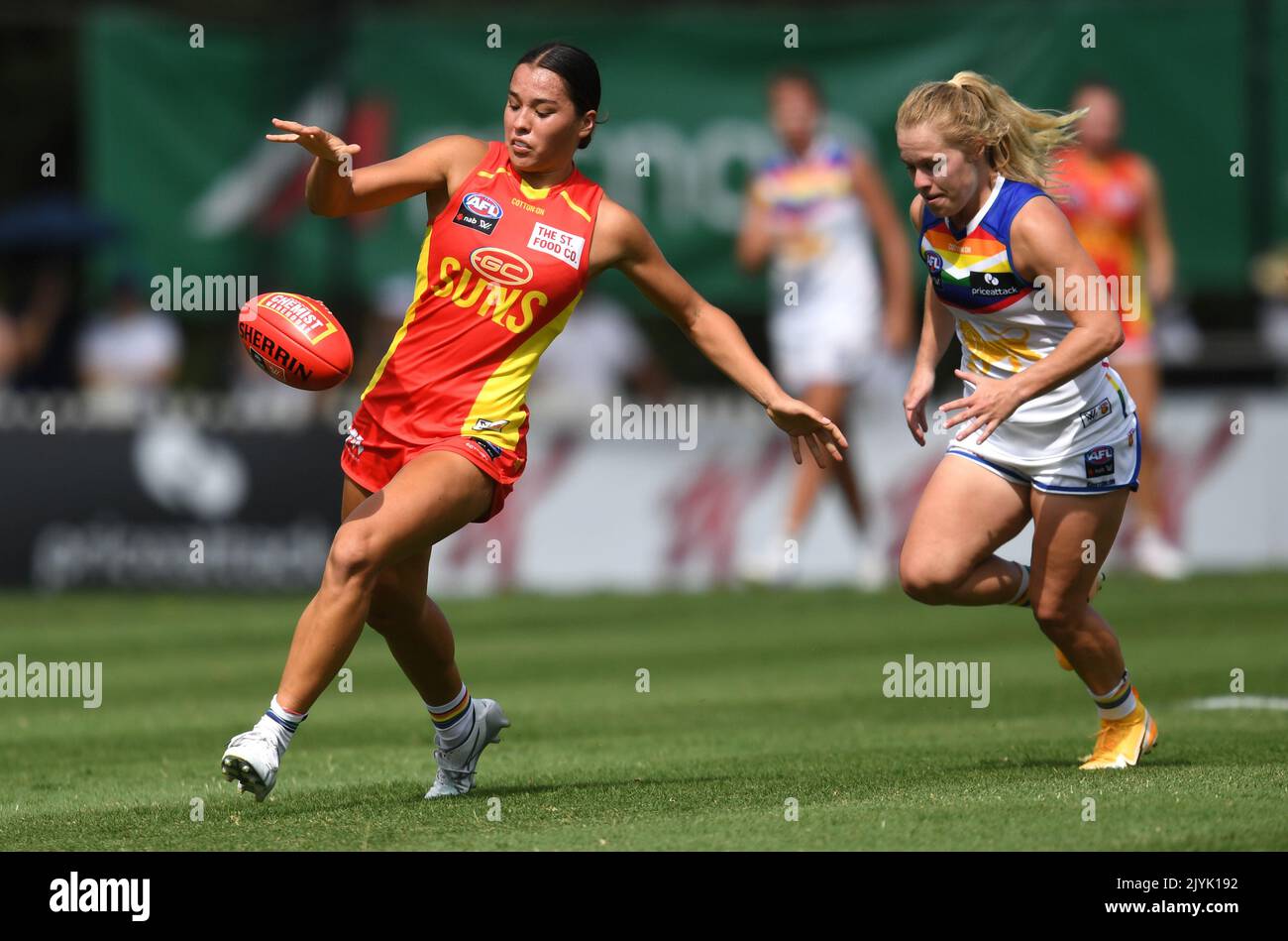 Lucy Single (left) of the Suns in action during the Round 2 AFLW match ...
