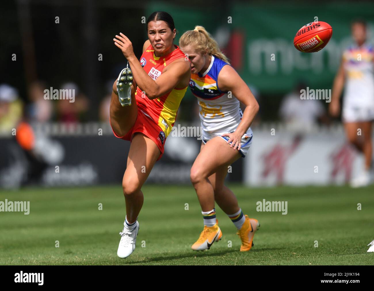 Lucy Single (left) of the Suns in action during the Round 2 AFLW match ...