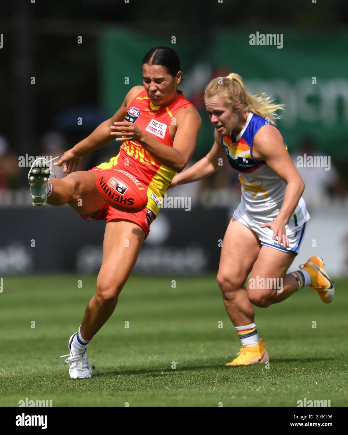 Lucy Single (left) of the Suns in action during the Round 2 AFLW match ...