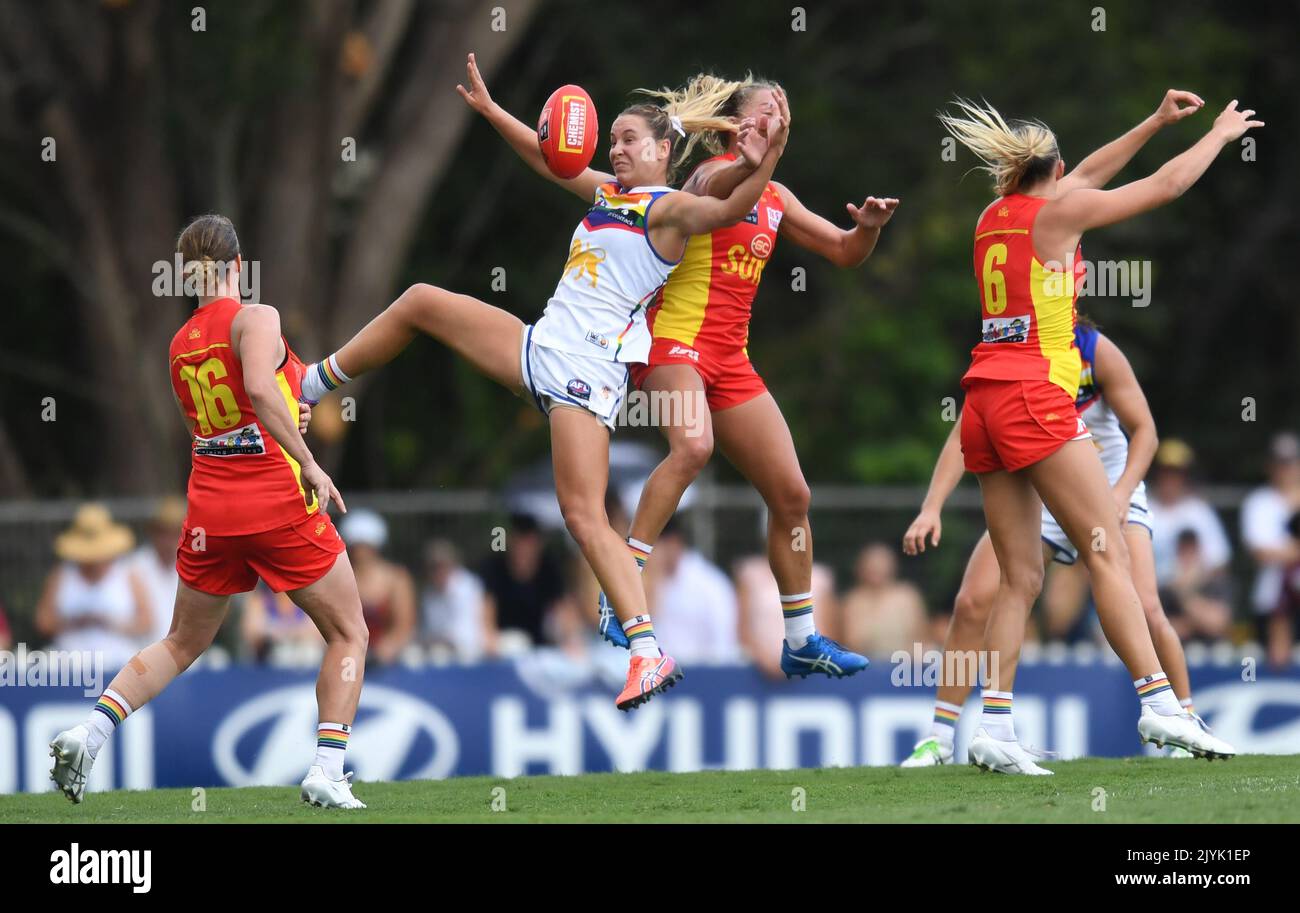 Natalie Grider (centre) of the Lions in action during the Round 2 AFLW ...