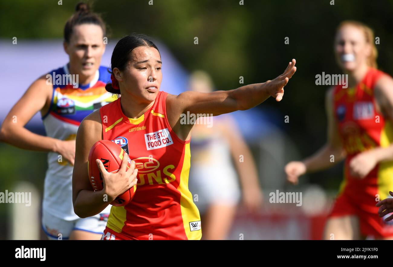 Lucy Single of the Suns in action during the Round 2 AFLW match between ...