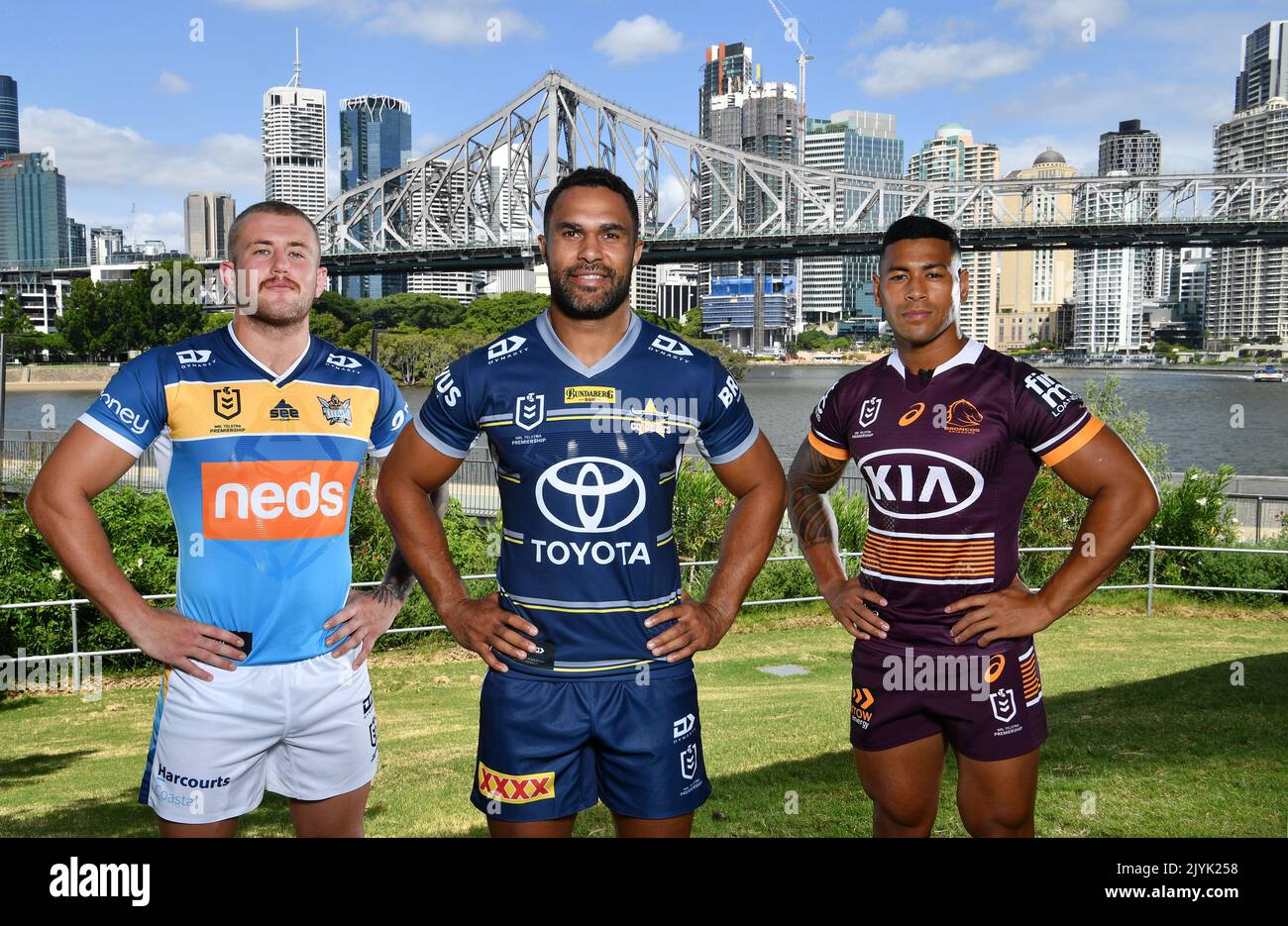 Sam McIntyre (left) of the Titans, Justin O’Neill (centre) of the ...