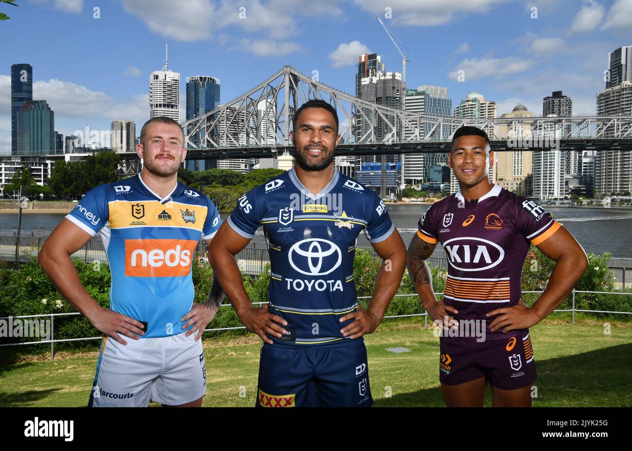 Sam McIntyre (left) of the Titans, Justin O’Neill (centre) of the ...