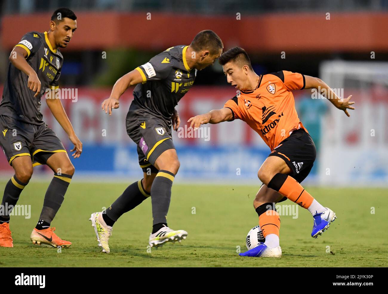 Rahmat Akbari (right) of the Roar in action against during the A-League ...