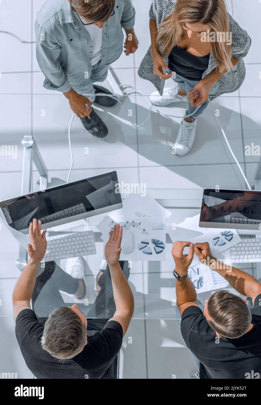 managers ask questions to employees Stock Photo - Alamy