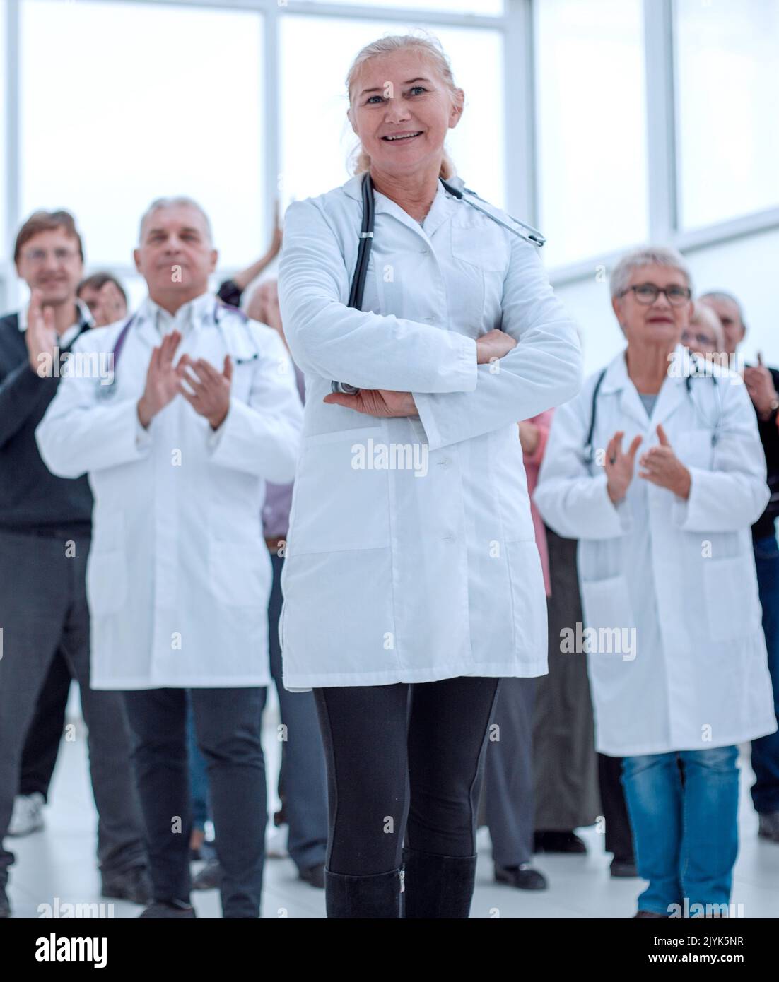 a group of doctors and recovered patients celebrate the victory Stock ...