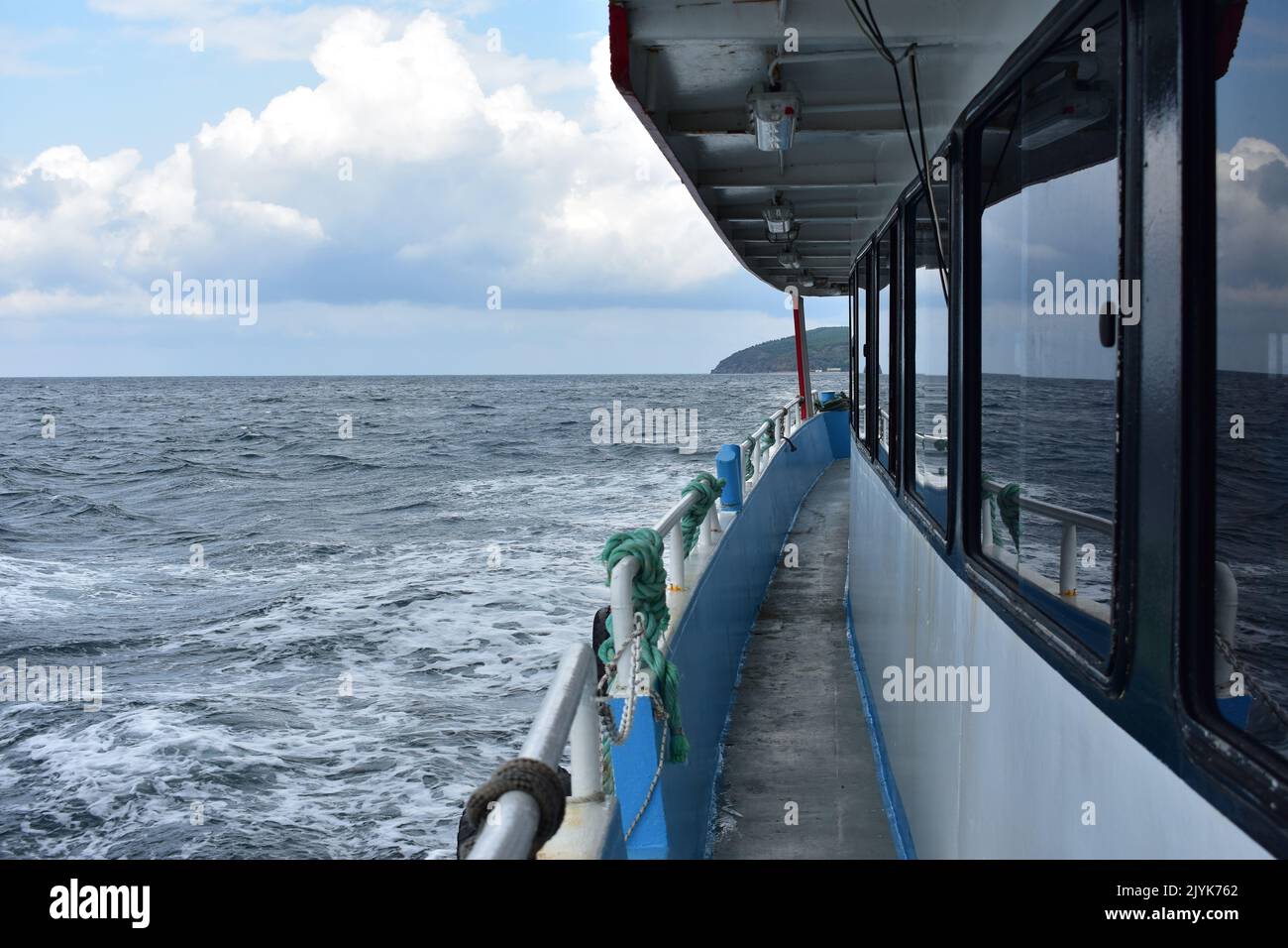 Beautiful view of the blue sea from the white ship, open deck corridor ...