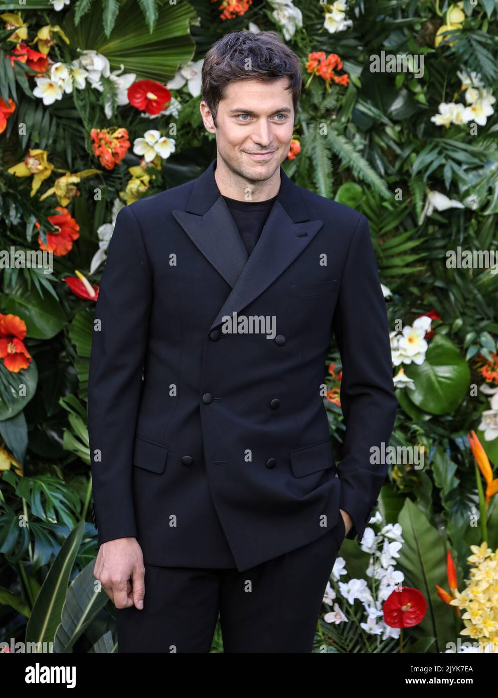 Lucas Bravo attends the world premiere of Ticket To Paradise at Odeon ...