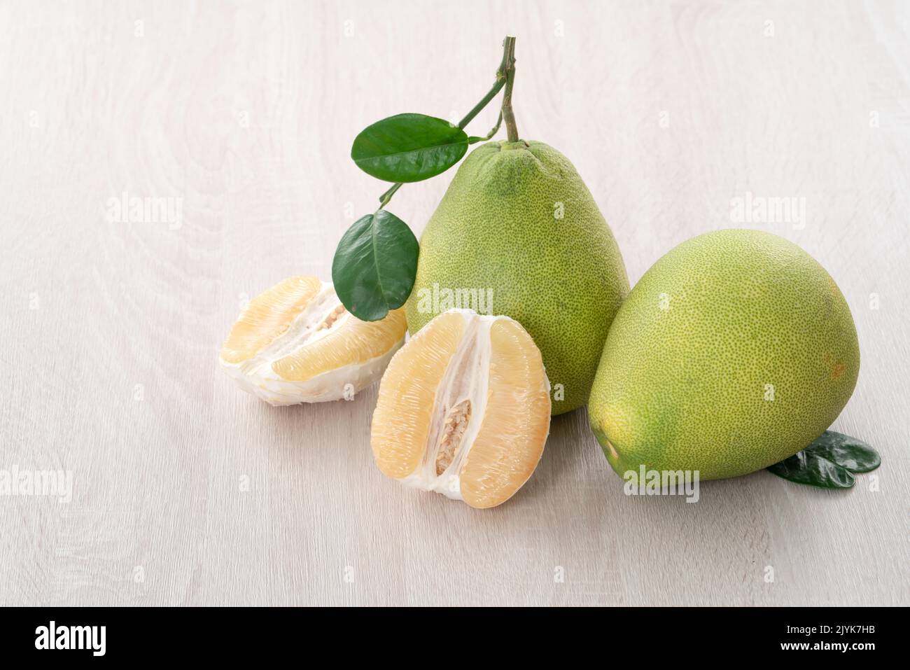 Close up of fresh peeled pomelo on wooden table background for Mid ...