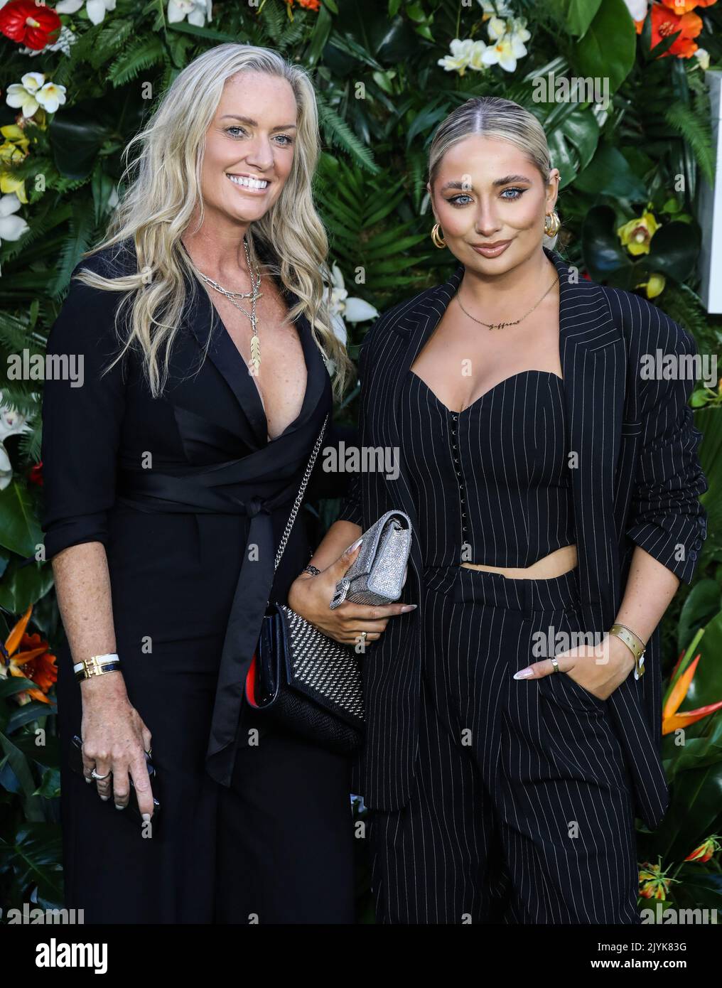 L R Wendy Barker And Saffron Barker Attend The World Premiere Of Ticket To Paradise At Odeon