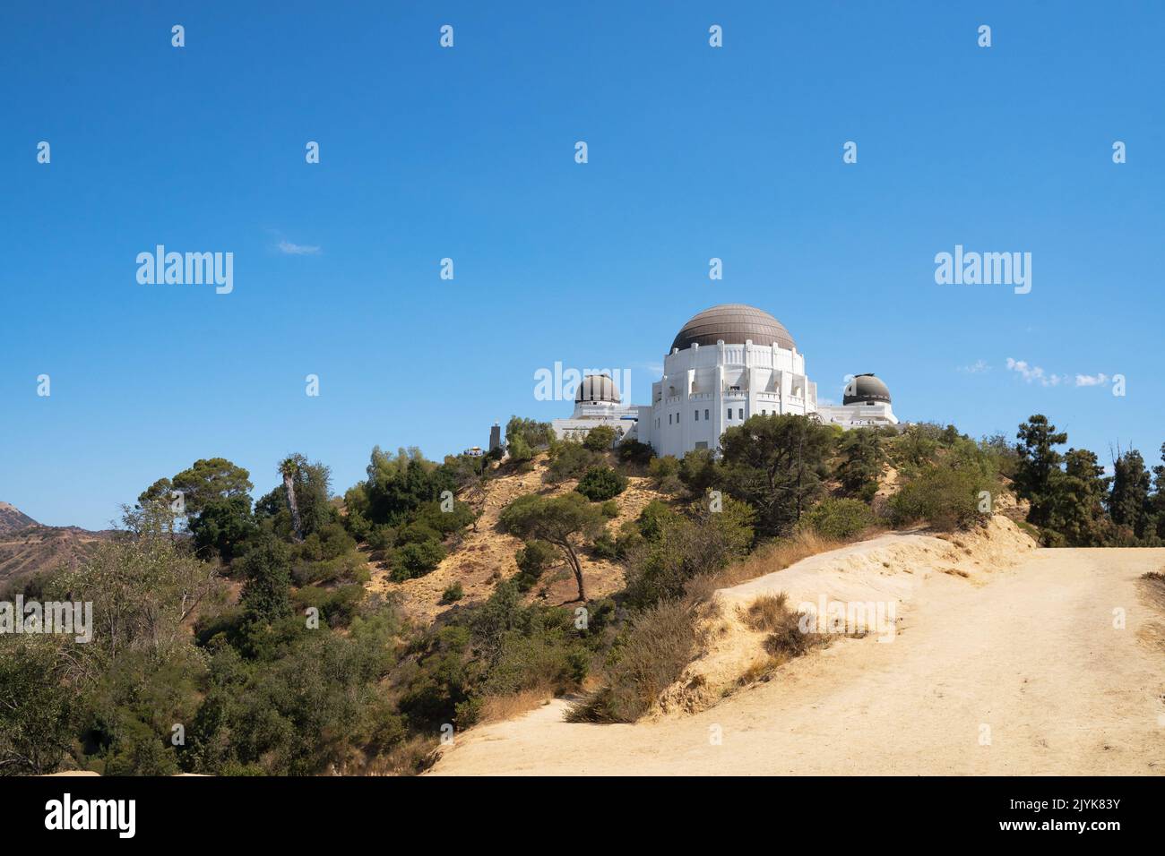 Daytime sunny day at Griffith Observatory and hiking trail in the park ...