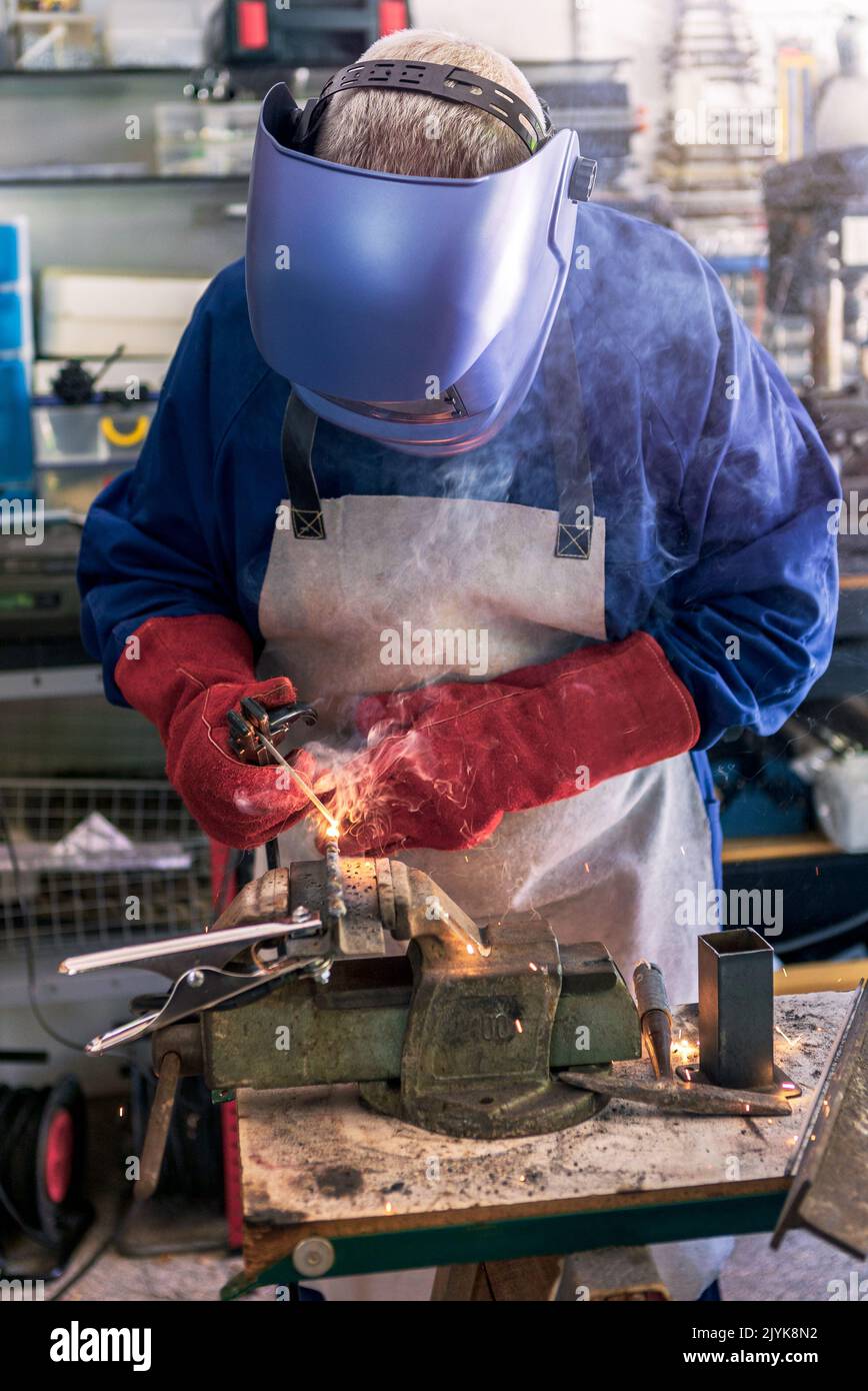 Skilled workers using special equipment hi-res stock photography and ...