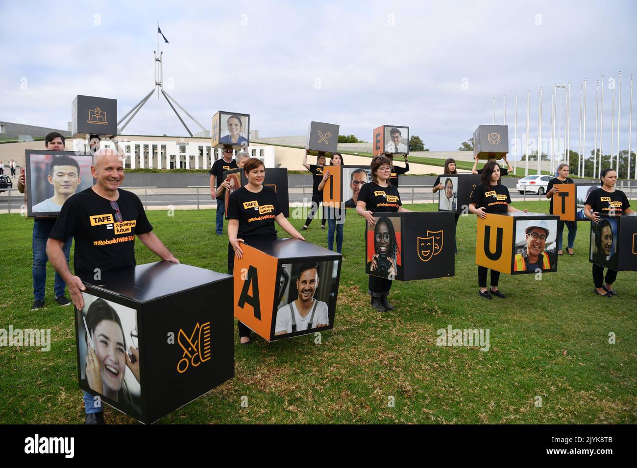 TAFE teachers at a rally to protest cuts to TAFE on lawns of Parliament ...