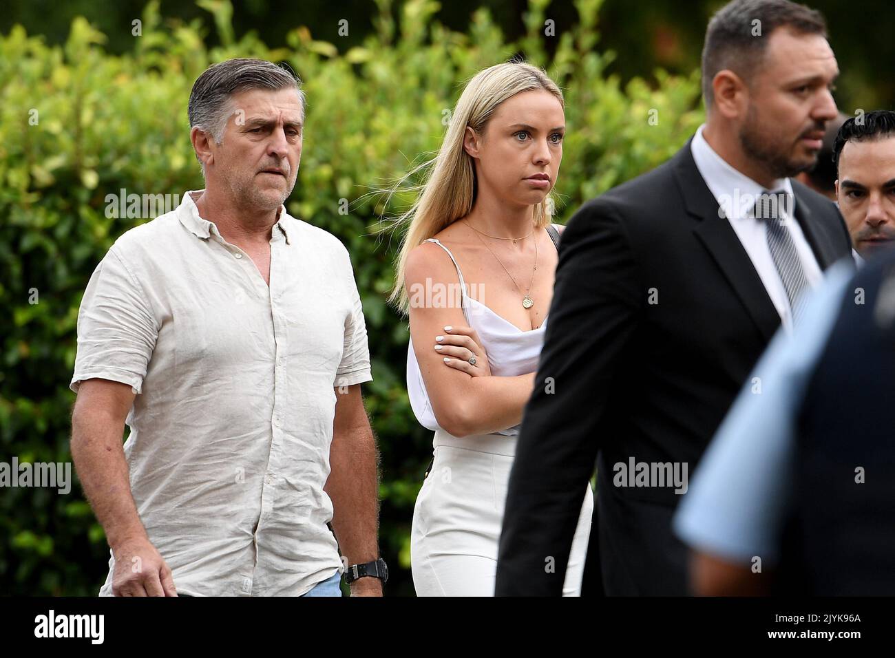 Kara Childerhouse (centre), the fiancee of former NRL player Michael ...