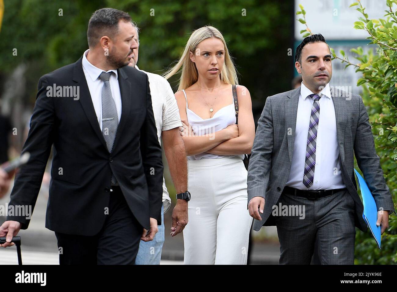 Kara Childerhouse (centre), the fiancee of former NRL player Michael ...