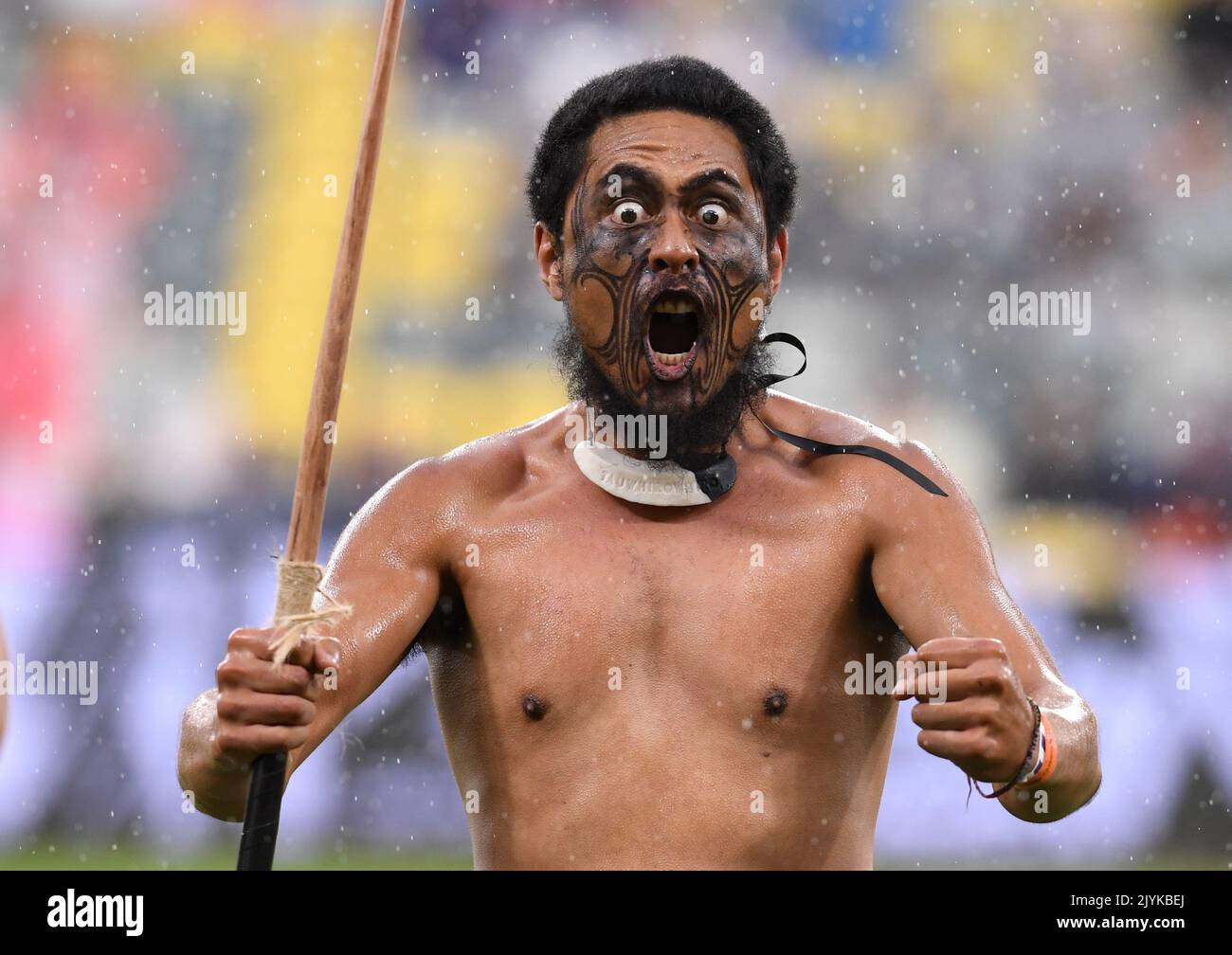 A Maori performer is seen performing a haka during the NRL match ...