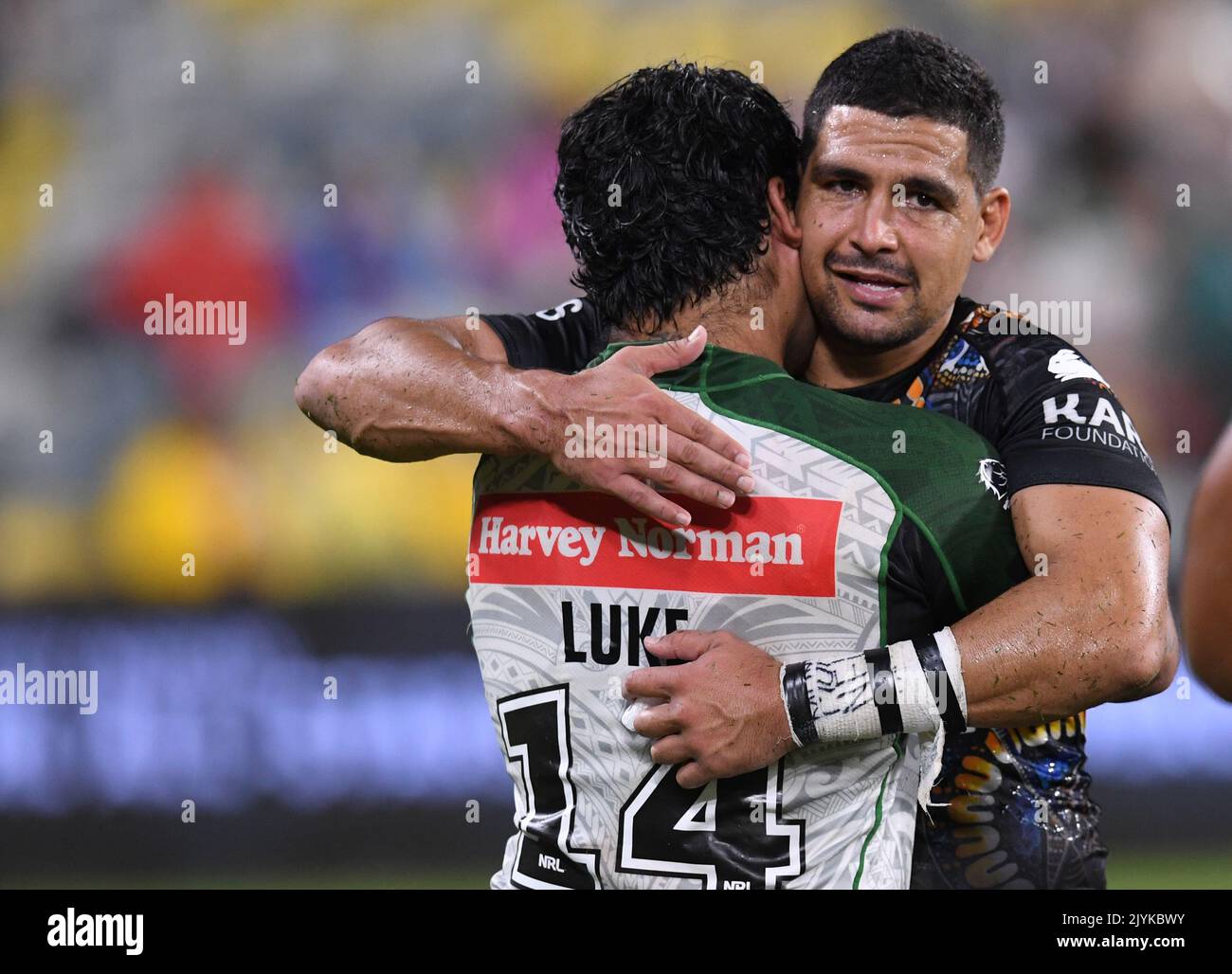 Cody Walker (right) of the Indigenous All Stars hugs Issac Luke (left ...