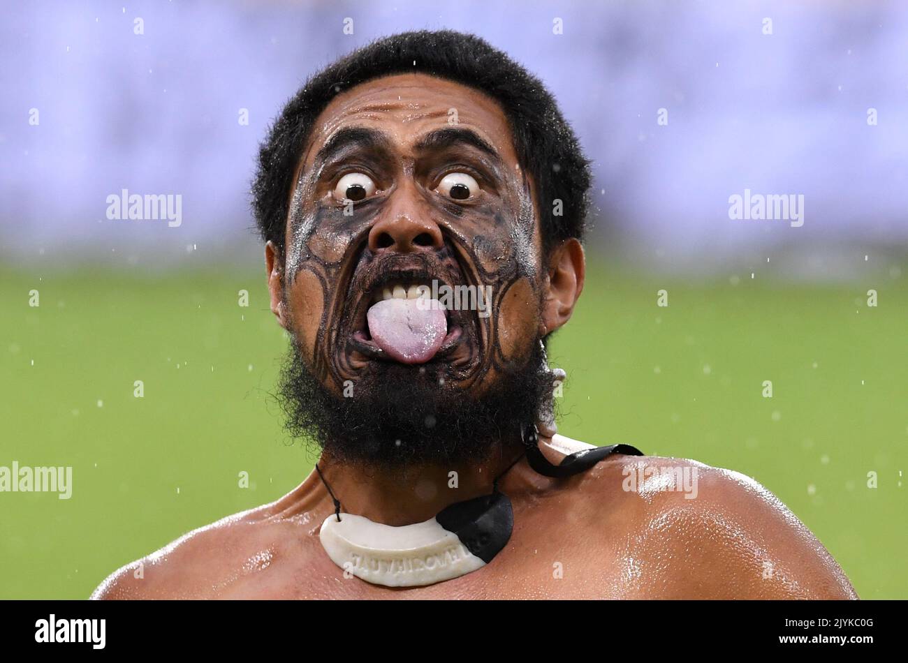 A Maori performer is seen performing a haka during the NRL match ...