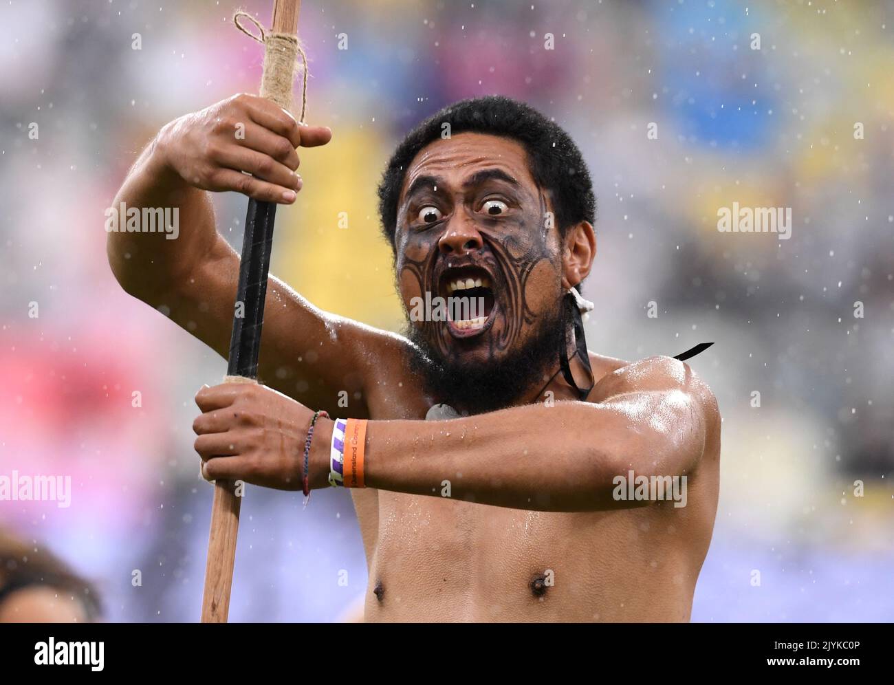 A Maori performer is seen performing a haka during the NRL match ...