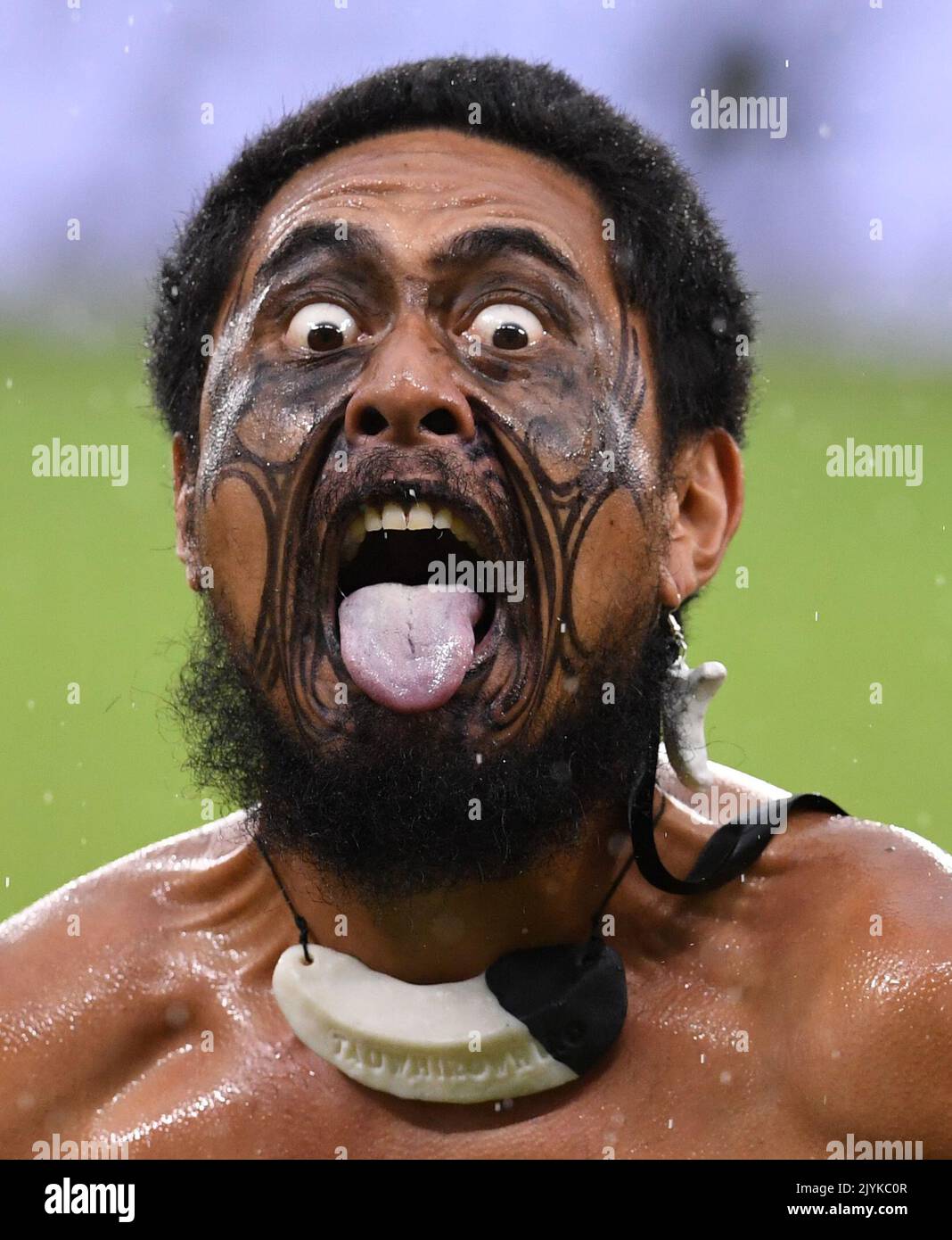 A Maori performer is seen performing a haka during the NRL match ...