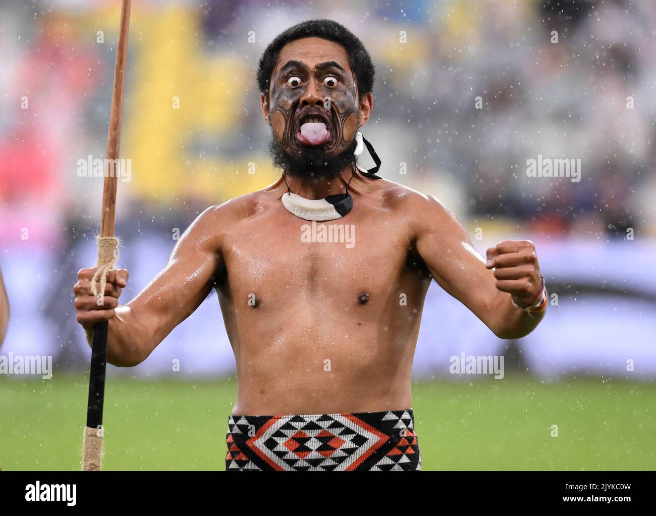 A Maori performer is seen performing a haka during the NRL match ...