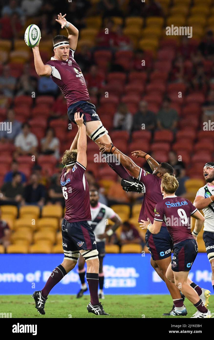 Angus Blyth (top) of the Reds is seen in the lineout during the Round 2 ...