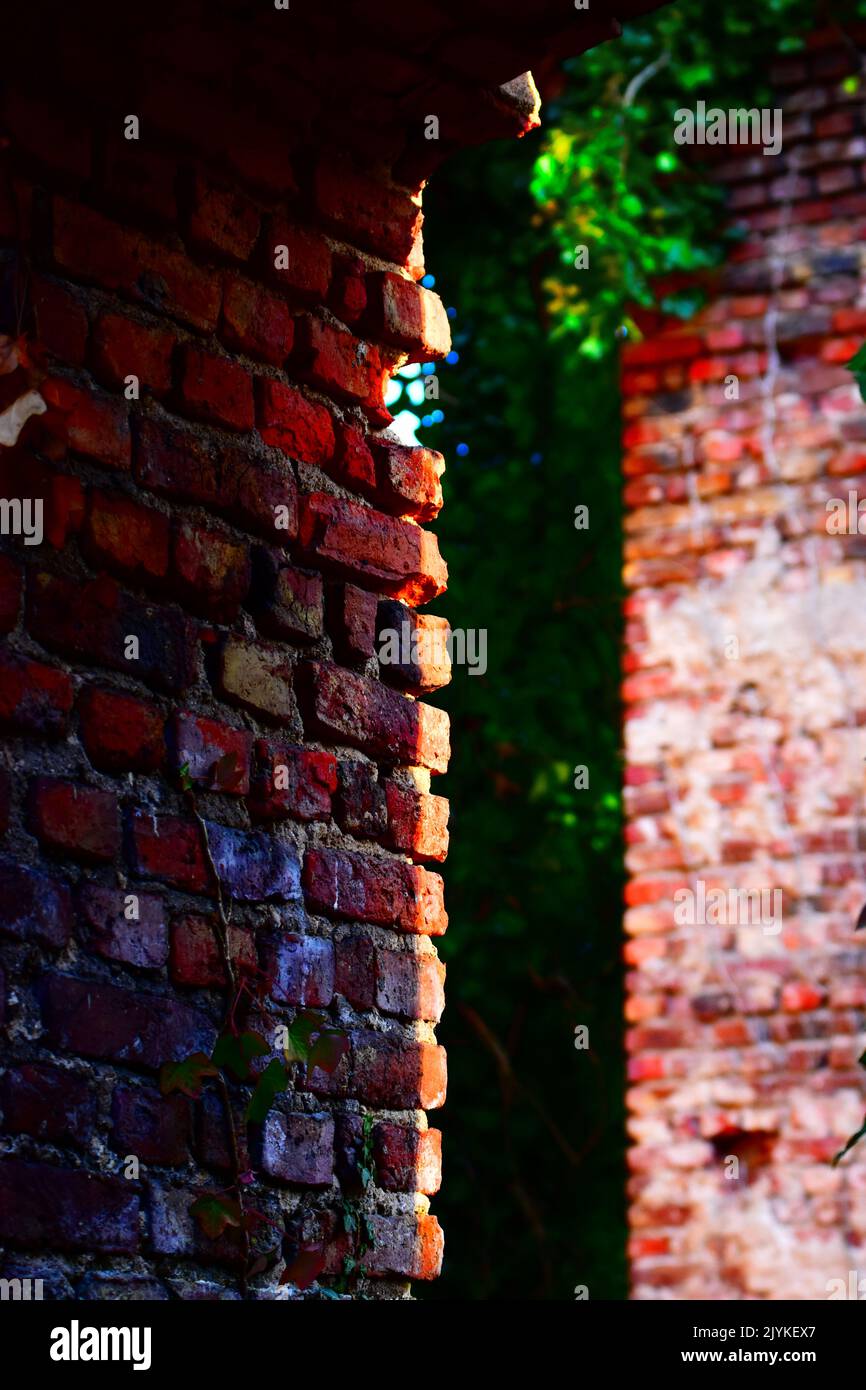 A red brick wall of a ruin Stock Photo - Alamy