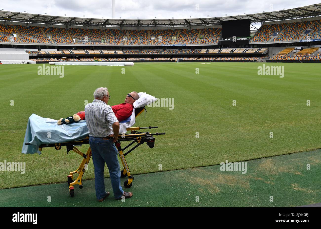 Former Queensland AFL Grand Final hero Ross Whyte (right), who has ...