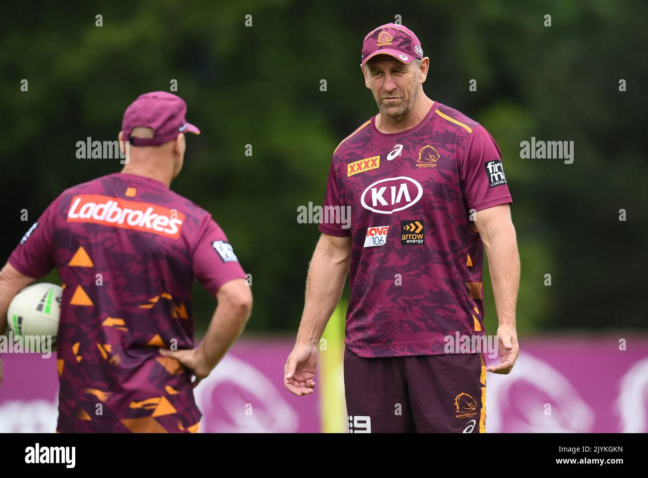 Broncos assistant coach John Cartwright (right) is seen during a ...