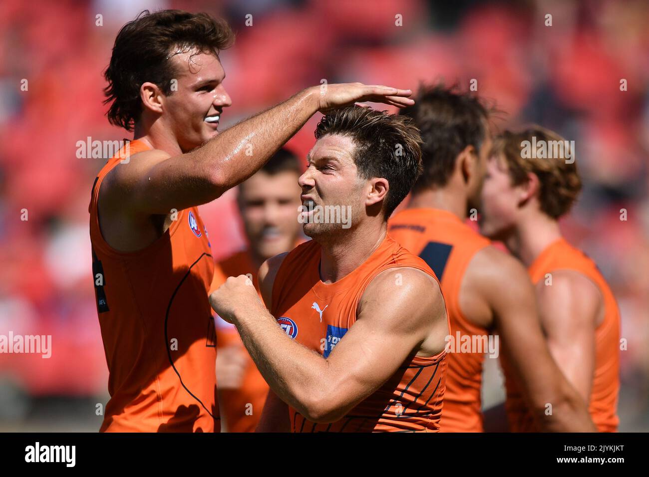 Toby Greene of the Giants celebrates kicking a goal during the AFL ...