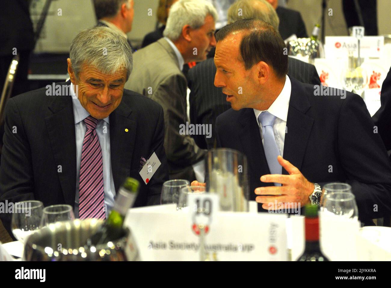 Prime Minister Tony Abbott speaks to Kerry Stokes at the Asia Society ...