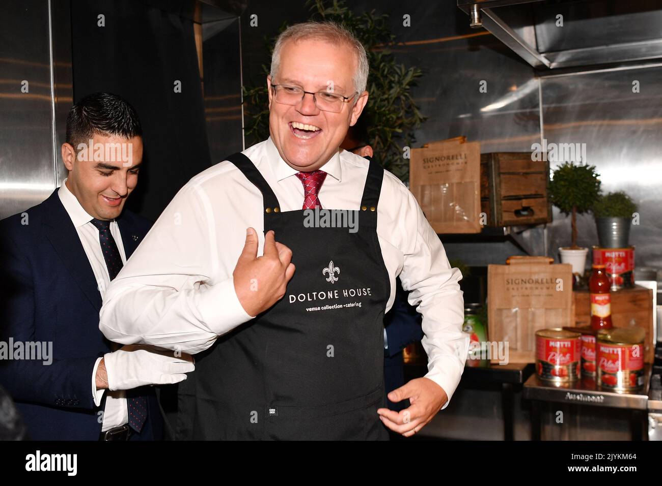 Prime Minister Scott Morrison is taught to make pasta during a visit to ...