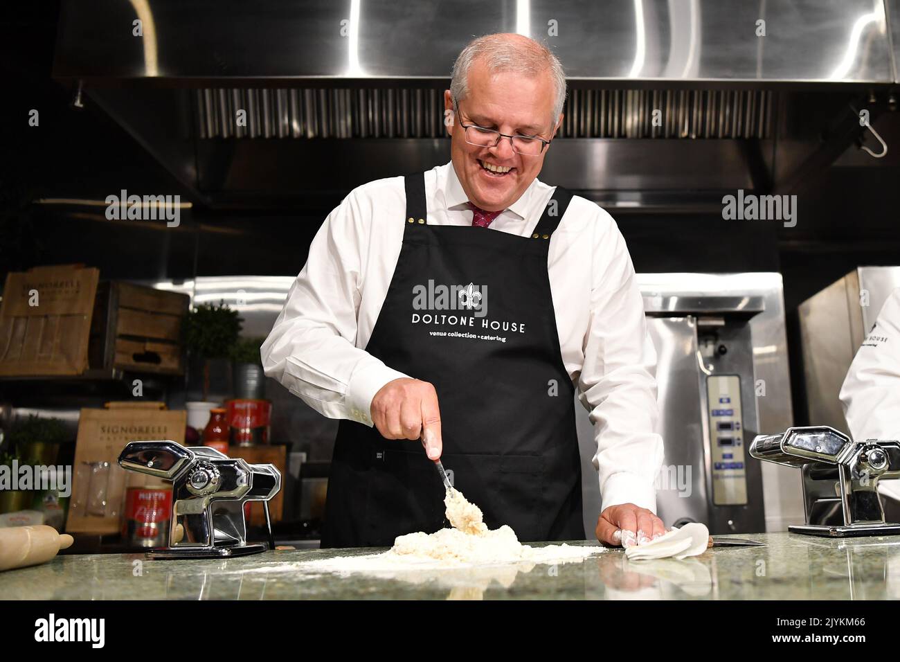 Prime Minister Scott Morrison is taught to make pasta during a visit to ...