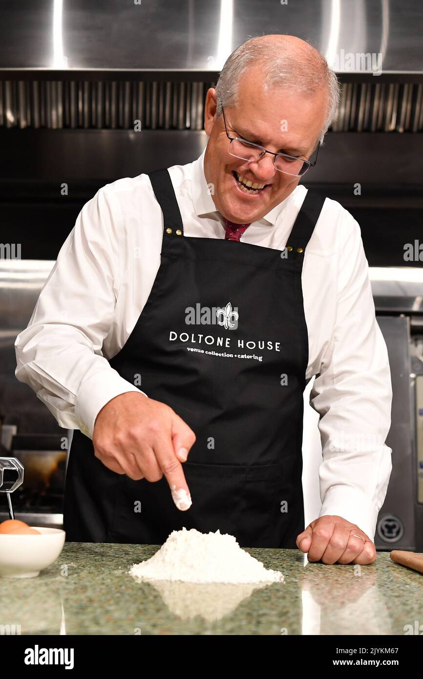 Prime Minister Scott Morrison is taught to make pasta during a visit to ...