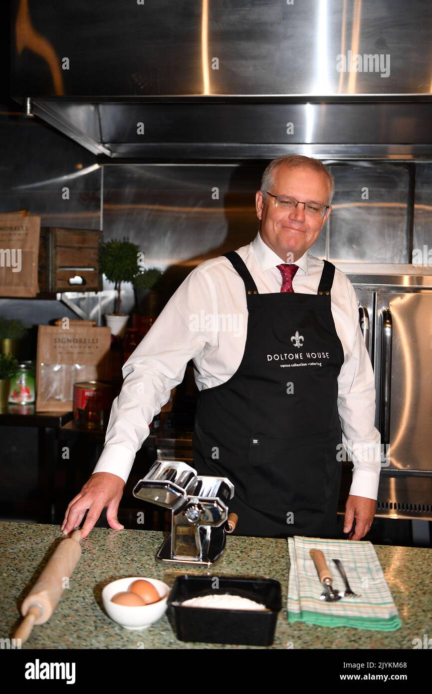 Prime Minister Scott Morrison is taught to make pasta during a visit to ...