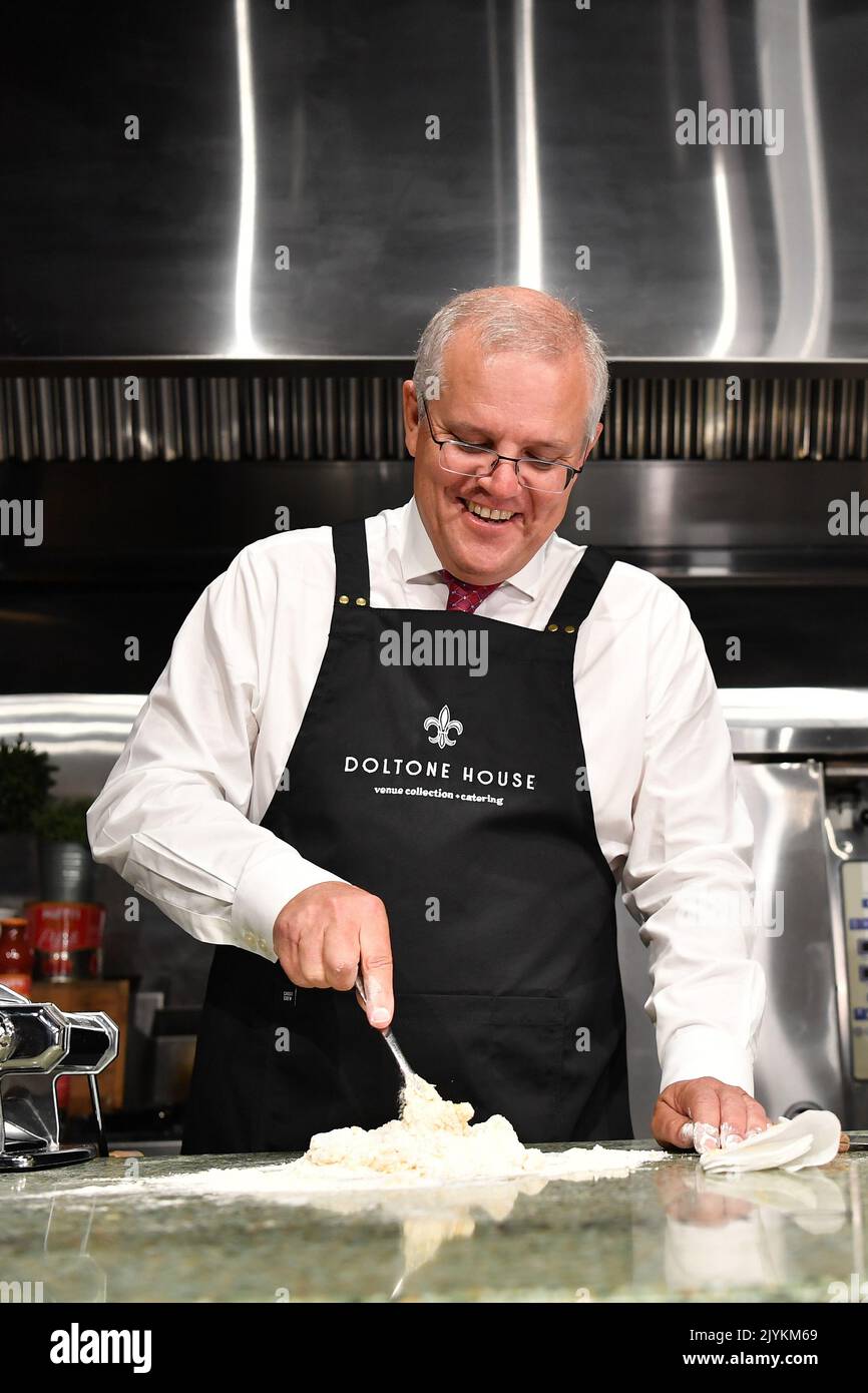 Prime Minister Scott Morrison is taught to make pasta during a visit to ...