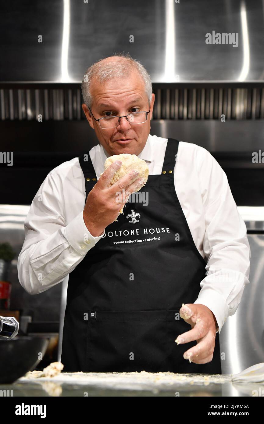 Prime Minister Scott Morrison is taught to make pasta during a visit to ...