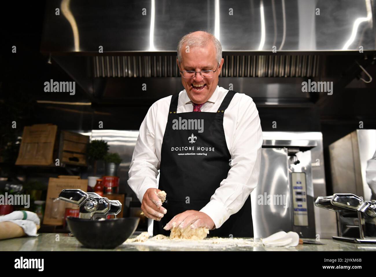 Prime Minister Scott Morrison is taught to make pasta during a visit to ...