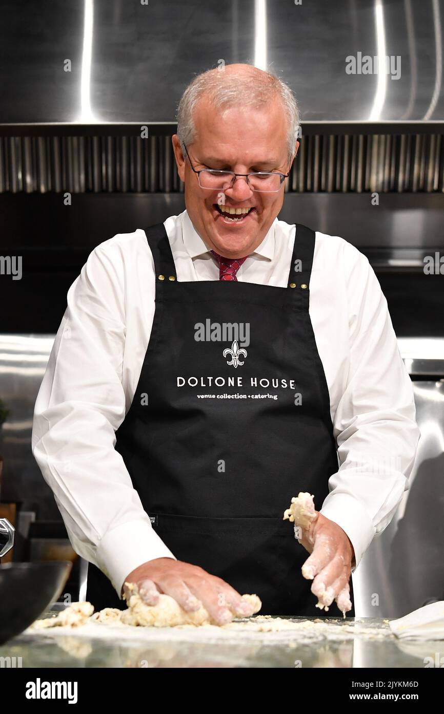 Prime Minister Scott Morrison is taught to make pasta during a visit to ...