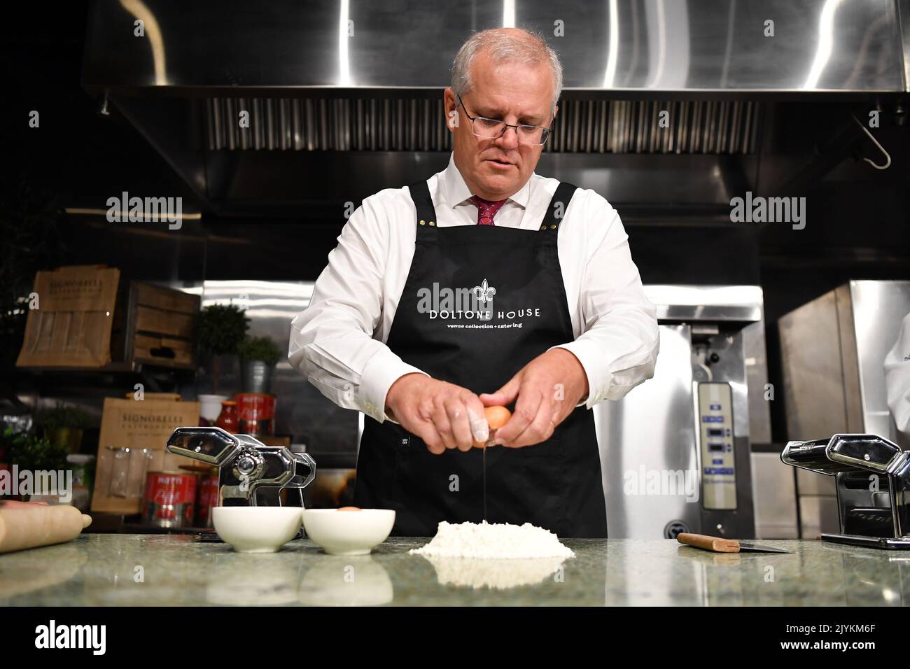 Prime Minister Scott Morrison is taught to make pasta during a visit to ...