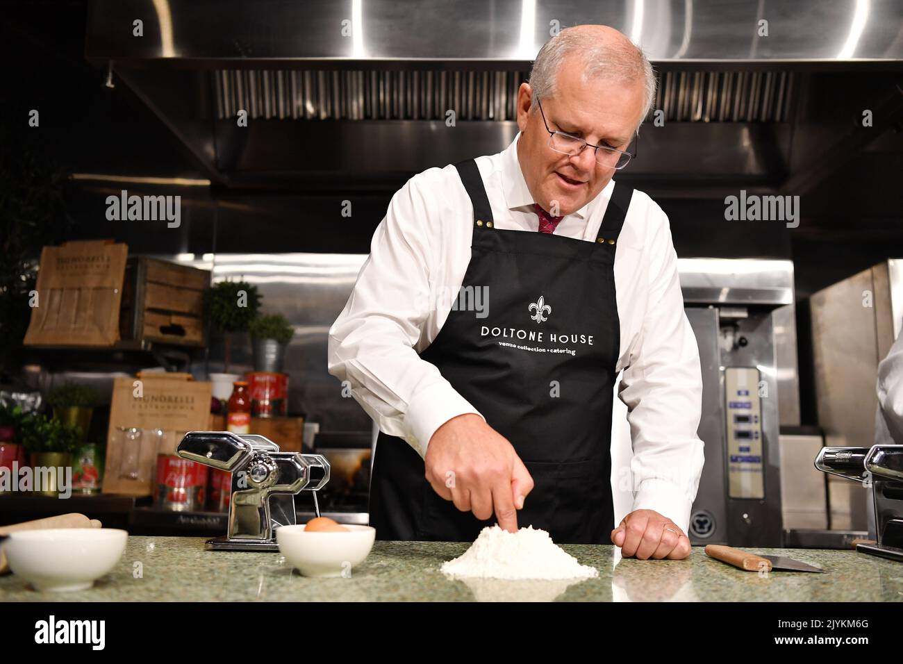 Prime Minister Scott Morrison is taught to make pasta during a visit to ...
