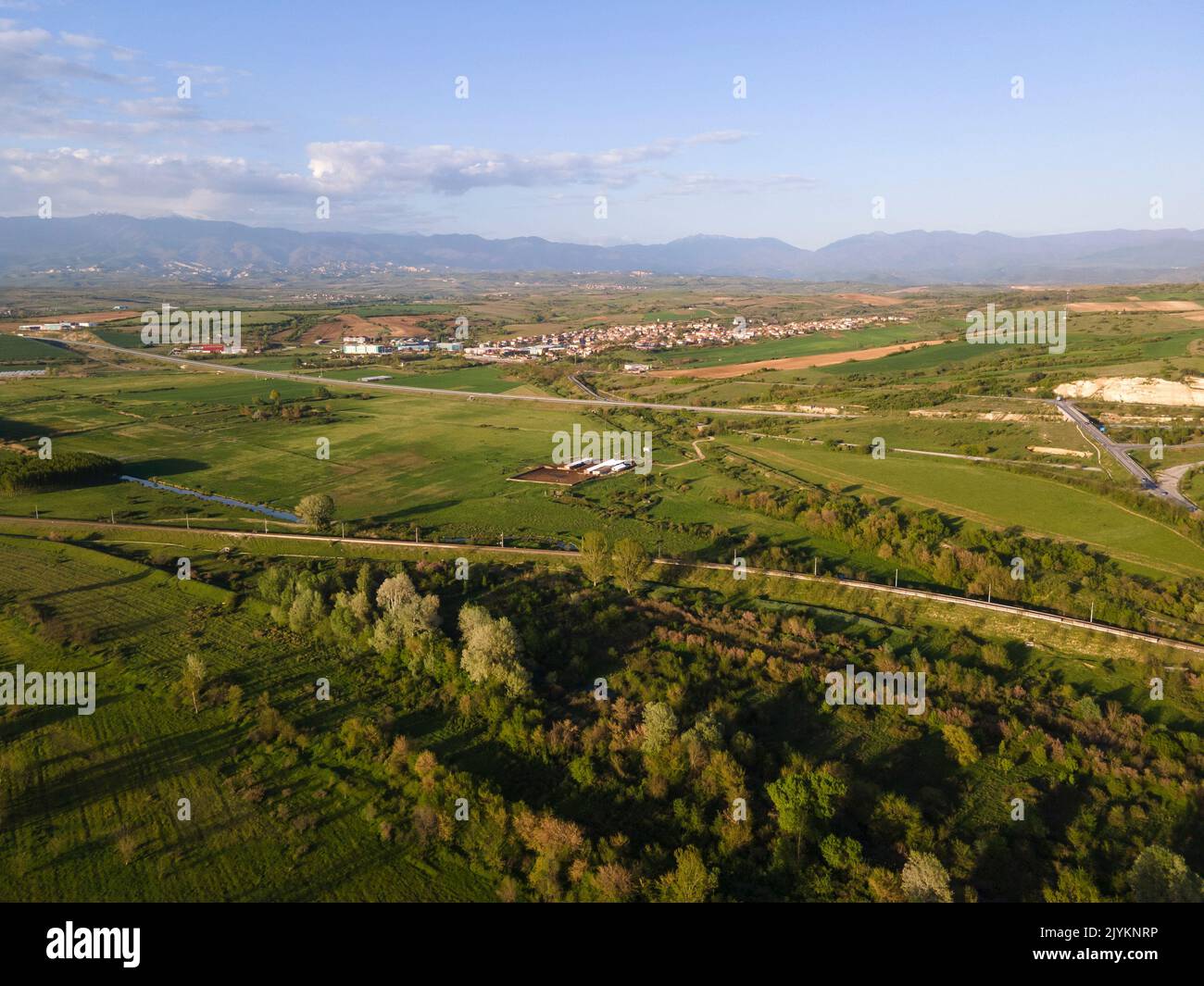 Aerial Sunset view of Struma river passing near village of Topolnitsa, Blagoevgrad region ...