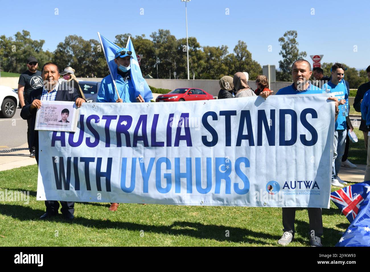 Protesters attend a rally for the Uyghur community outside Parliament ...