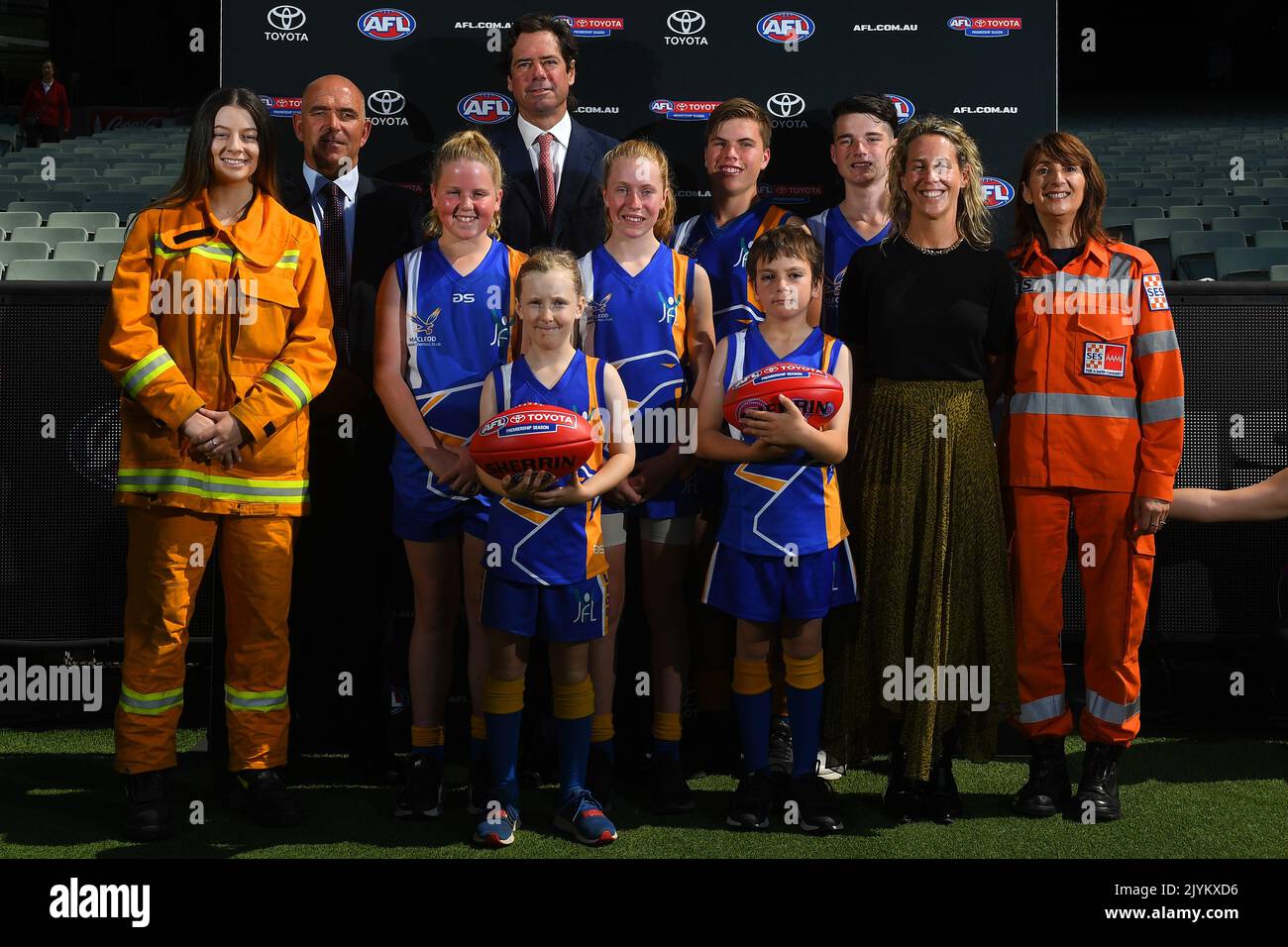 AFL CEO Gillon McLauchlan (centre) and MCC CEO- Stuart Fox (2nd left ...