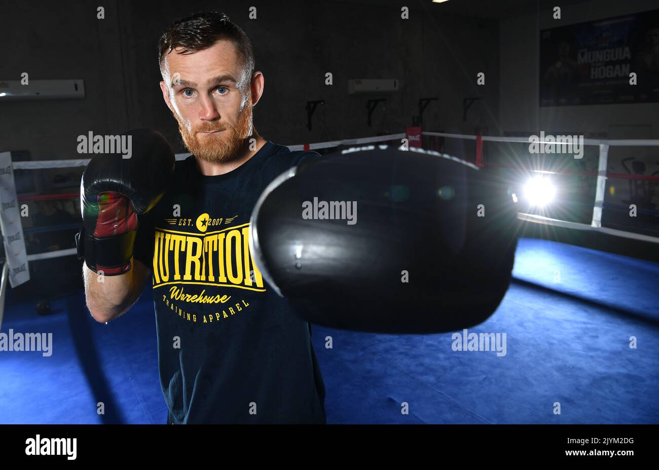 Boxer Dennis Hogan is seen posing for a photograph during a media ...