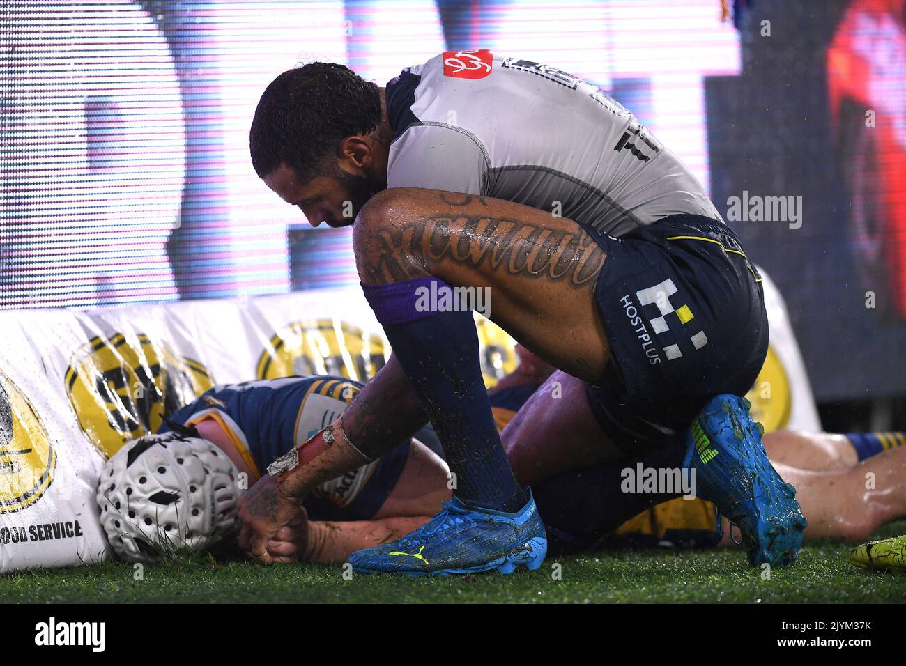 Josh Addo-Carr of the Storm checks on Reed Mahoney of the Eels after ...