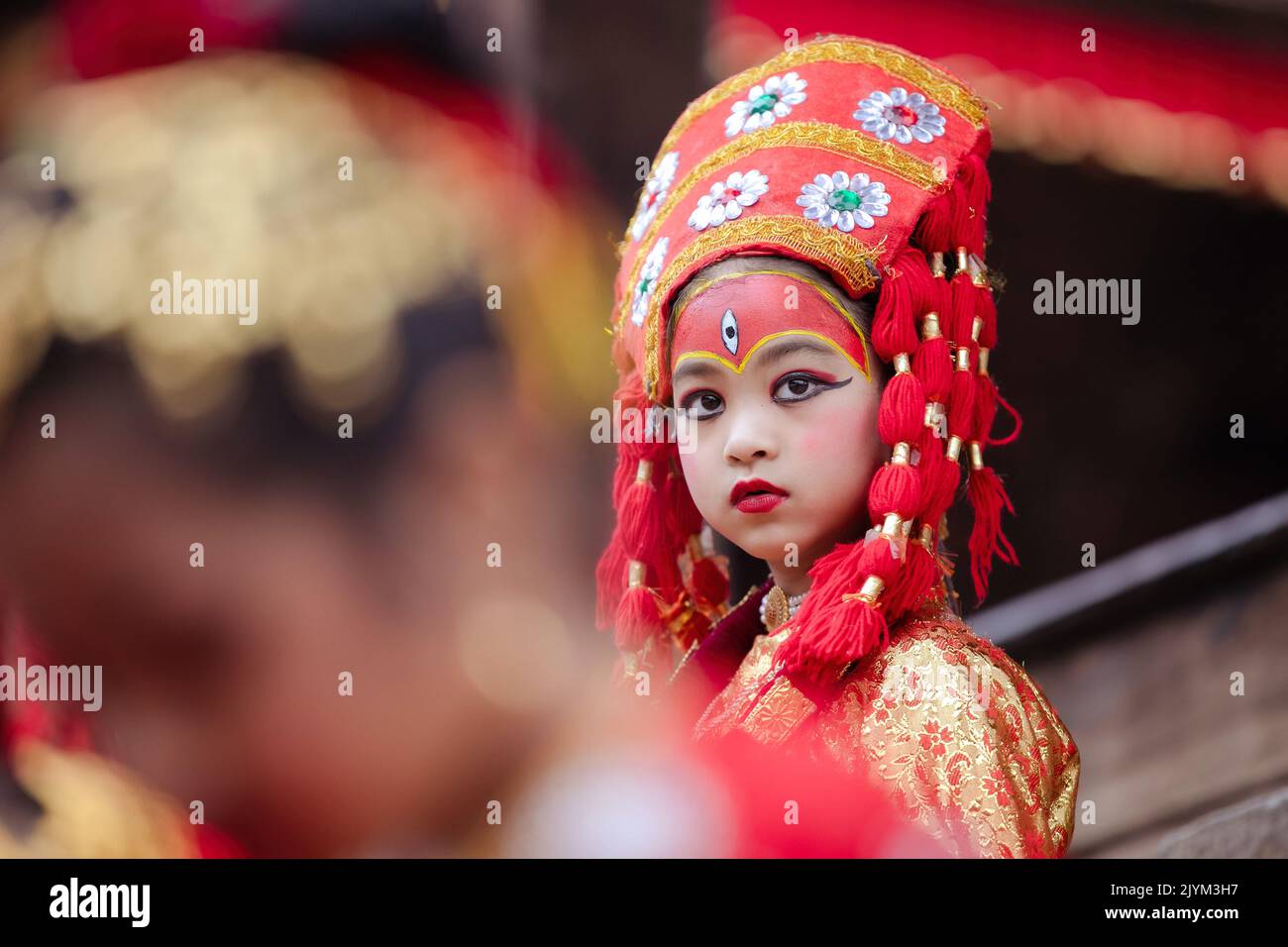 A young girl dressed as the Living Goddess Kumari takes part in the ...