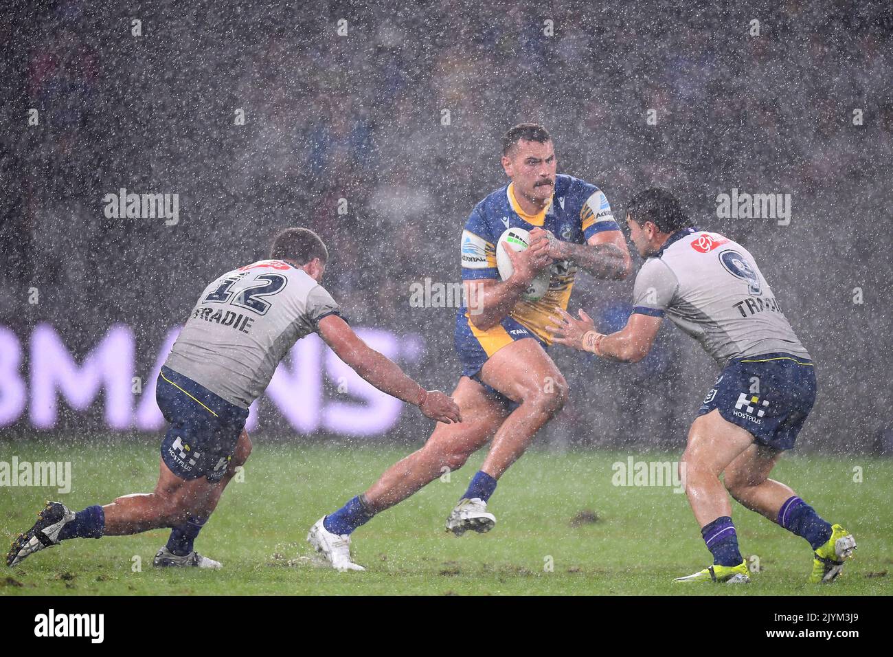 Reagan Campbell-Gillard of the Eels is tackled by Brandon Smith of the ...