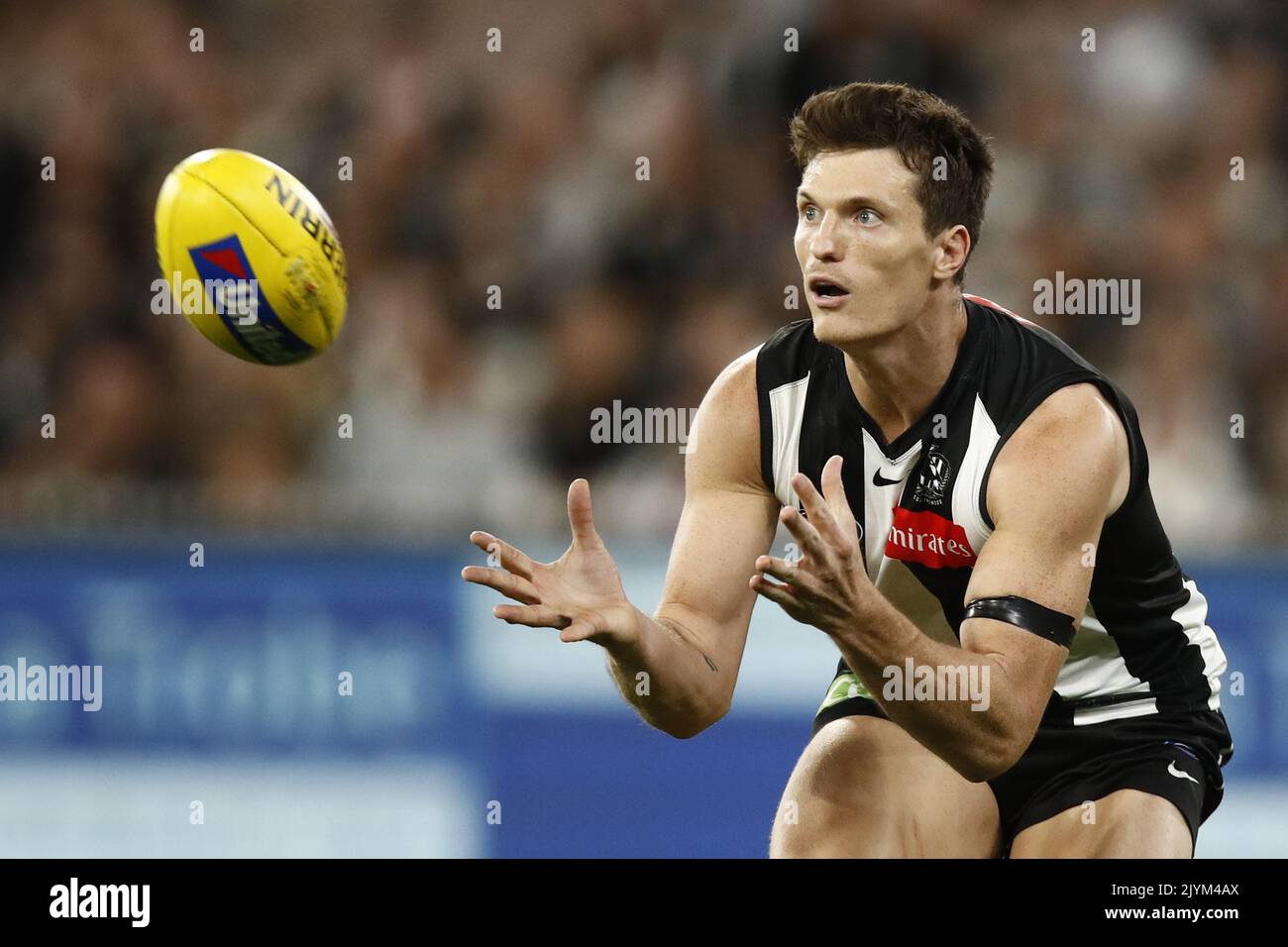 Brody Mihocek of the Magpies marks the ball during the Round 1 AFL ...